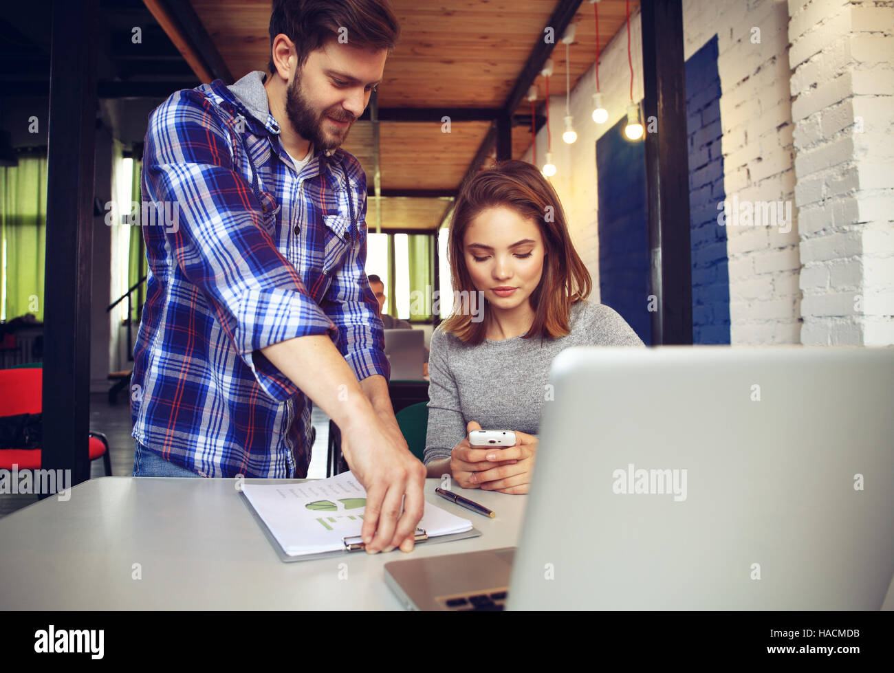 Young professionals work in modern office Stock Photo - Alamy