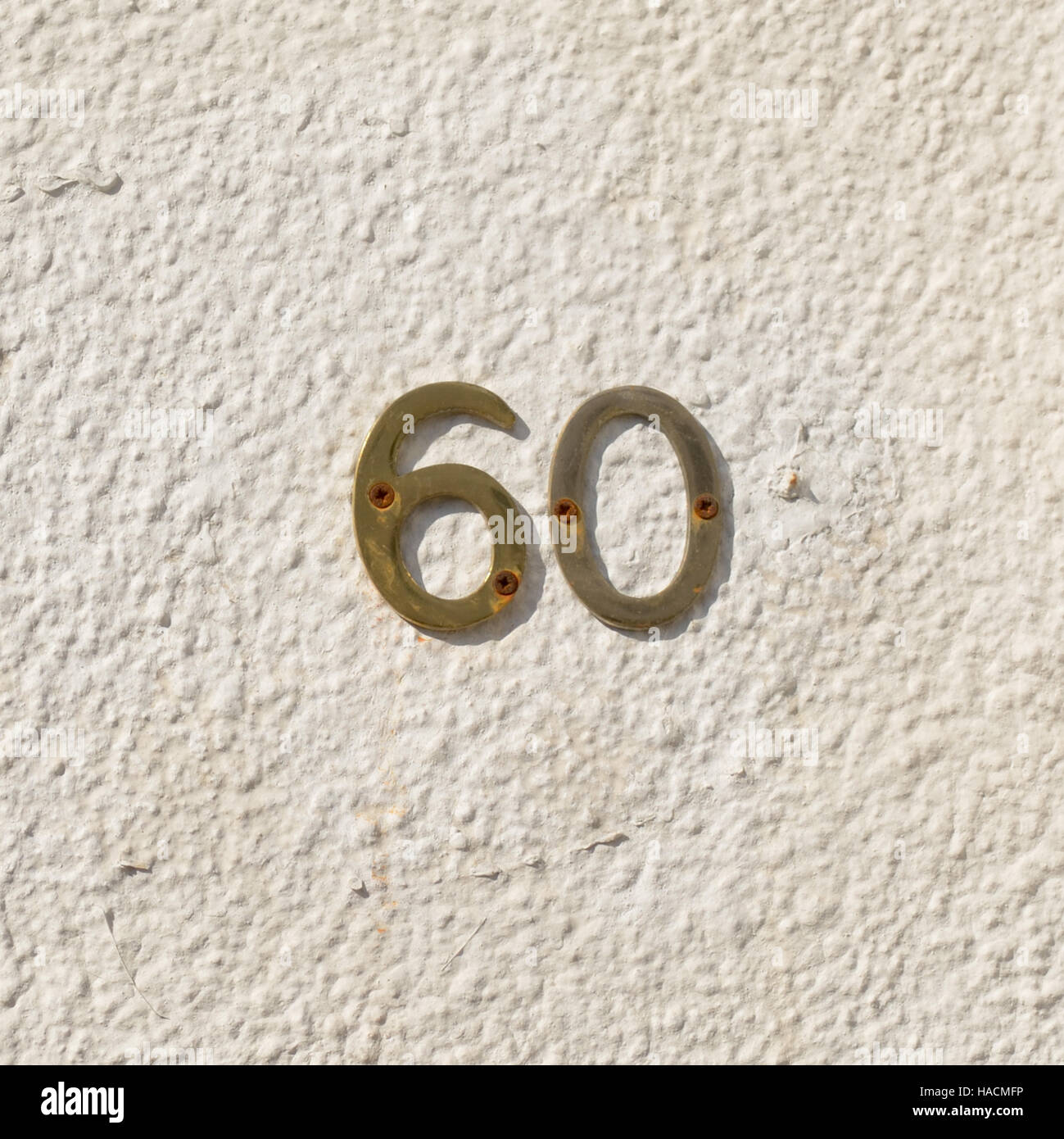 House Number 60 sign on wall Stock Photo - Alamy
