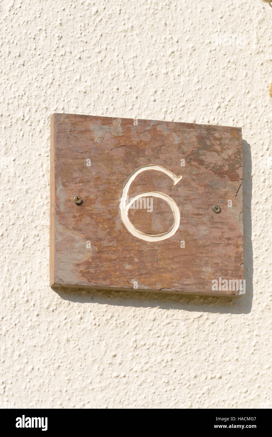 House Number 6 sign on wall Stock Photo - Alamy