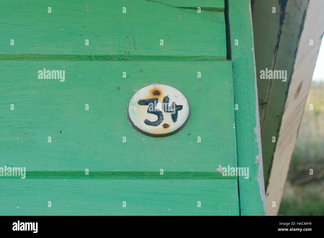 House Number 34 sign on door Stock Photo - Alamy
