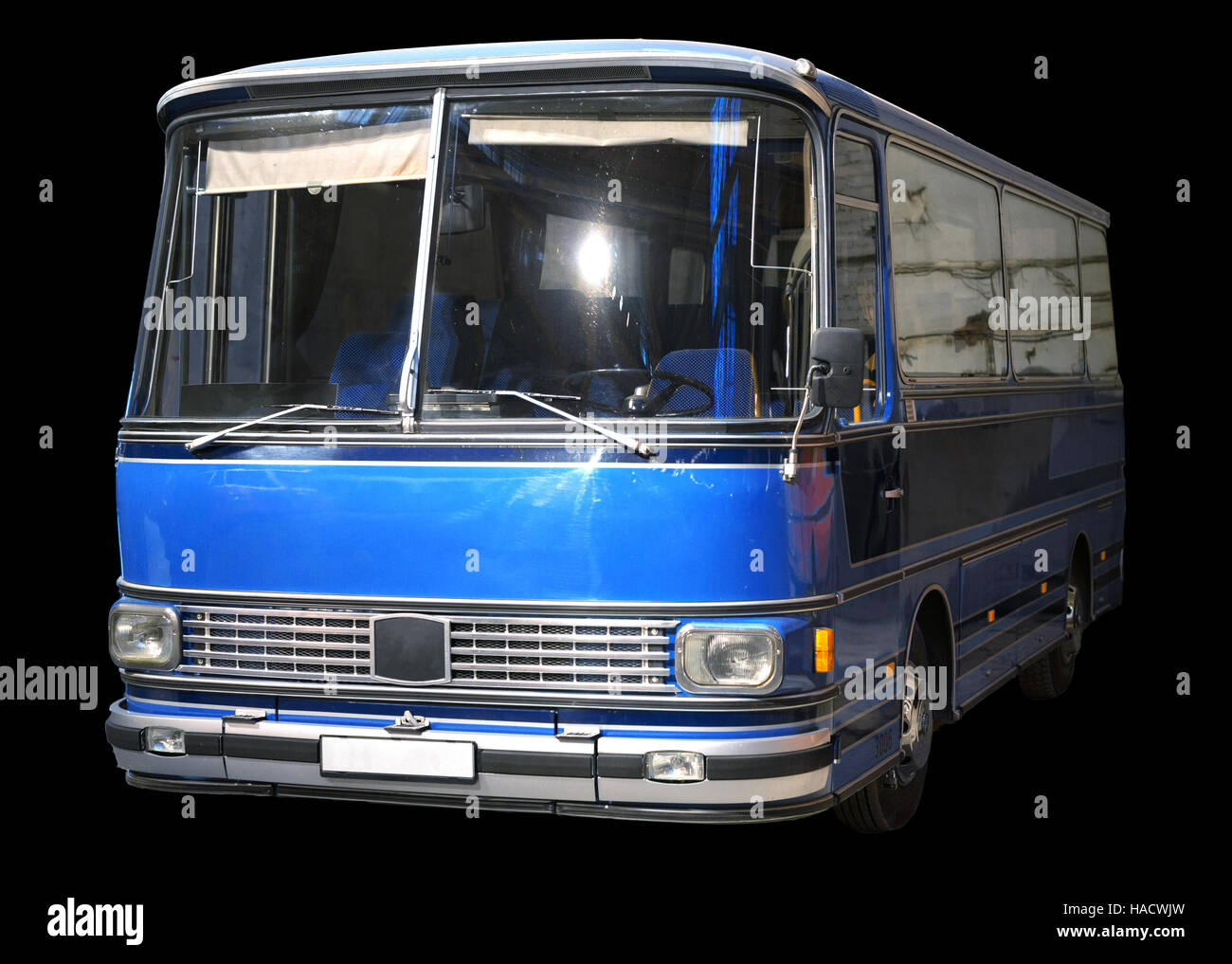 Old retro blue bus. Isolated on black background Stock Photo - Alamy