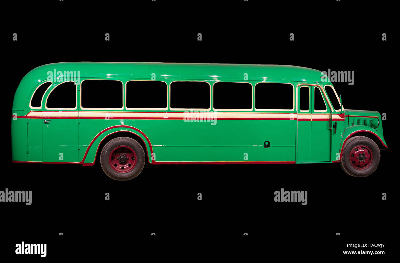 Old retro green bus. Isolated on black background Stock Photo - Alamy