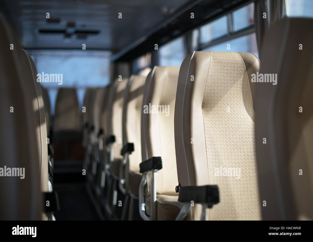 Empty interior of the bus at morning Stock Photo - Alamy