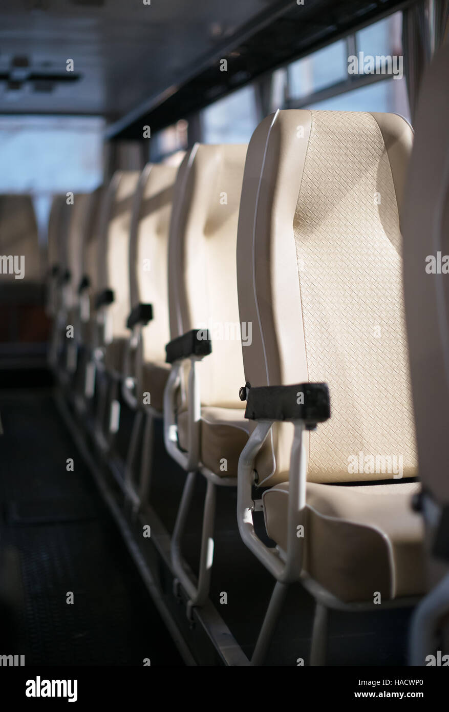 Empty interior of the bus at morning Stock Photo - Alamy