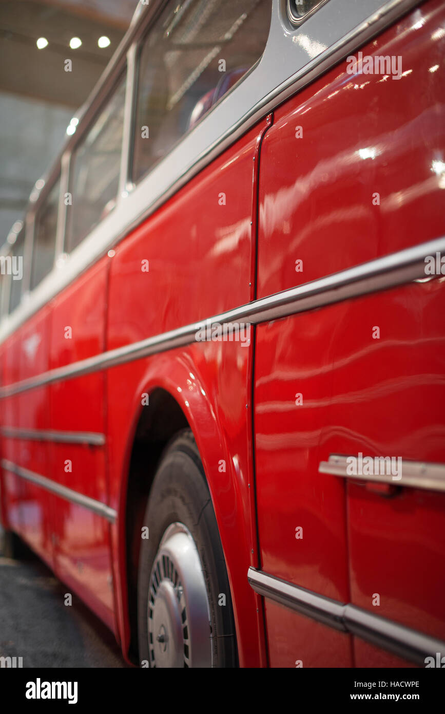 Part of red retro bus with passenger seats Stock Photo - Alamy