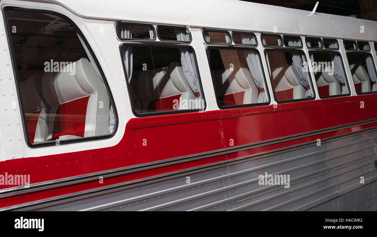 Part of red retro bus with passenger seats Stock Photo - Alamy