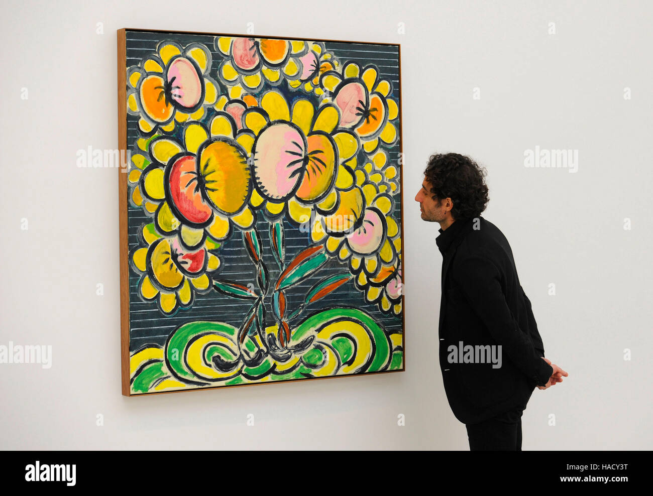 A man views a painting by Ansel Krut titled Arse Flowers In Bloom, at a ...