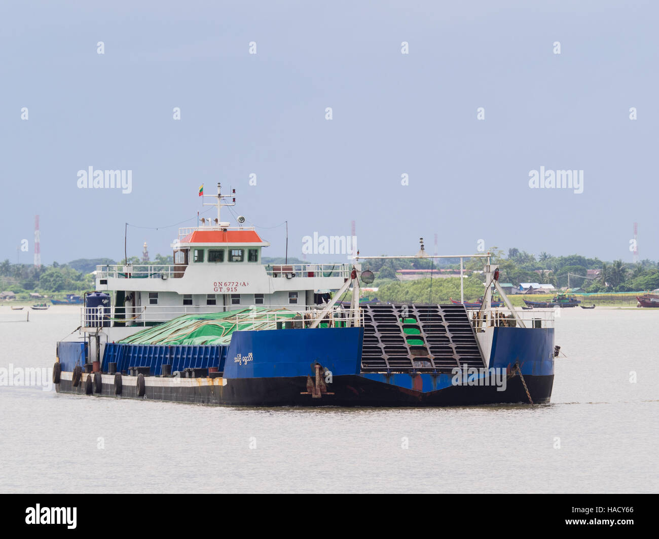 Modern, river going cargo vessel with a ramp for loading and unloading ...