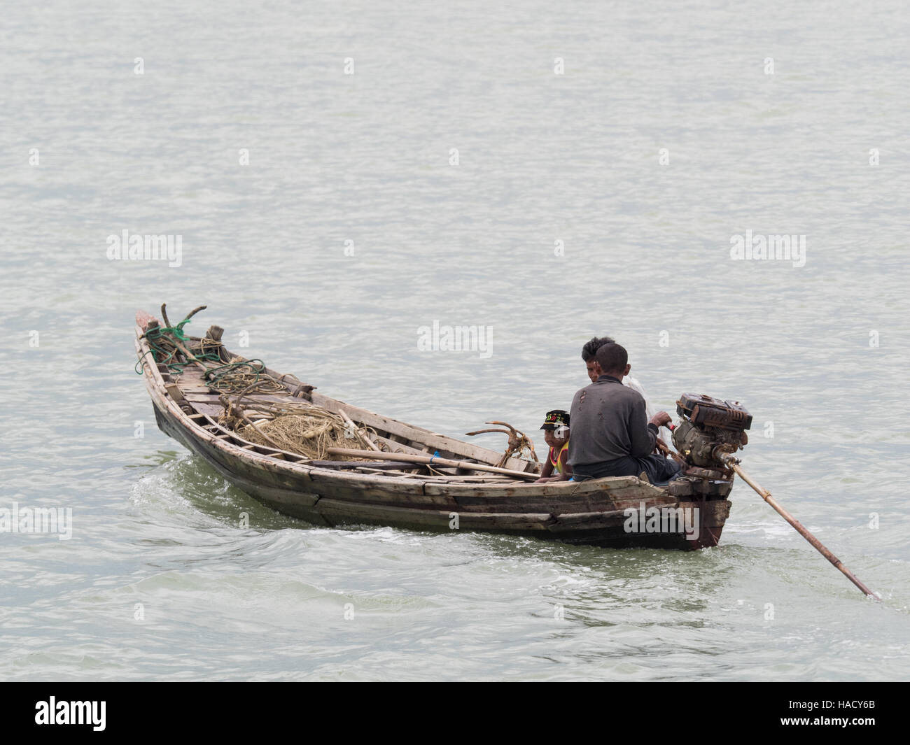 Traditional, wooden boat on Kaladan River in the Rakhine State of ...
