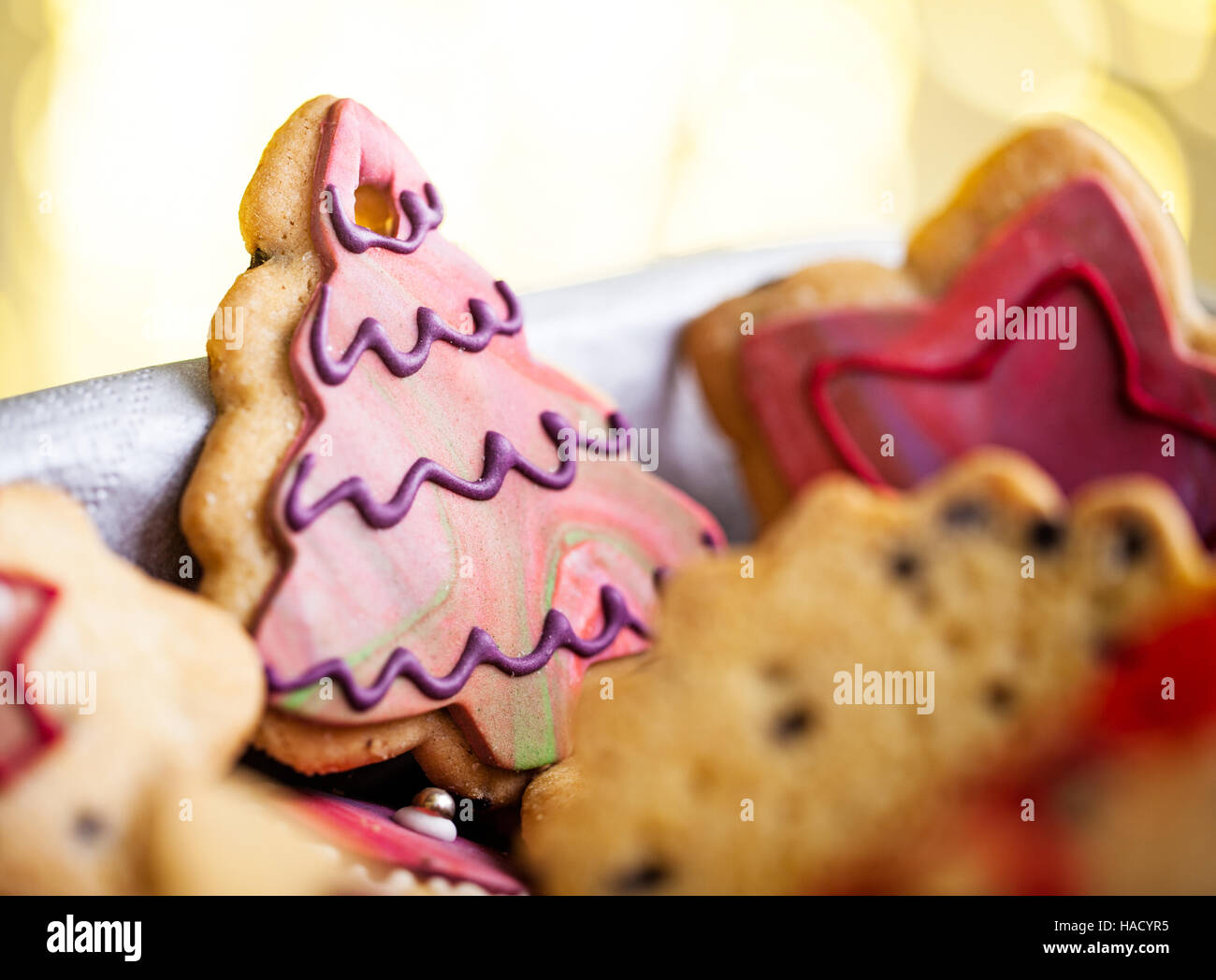 Pink and violet gingerbread cookies in close-up Stock Photo - Alamy