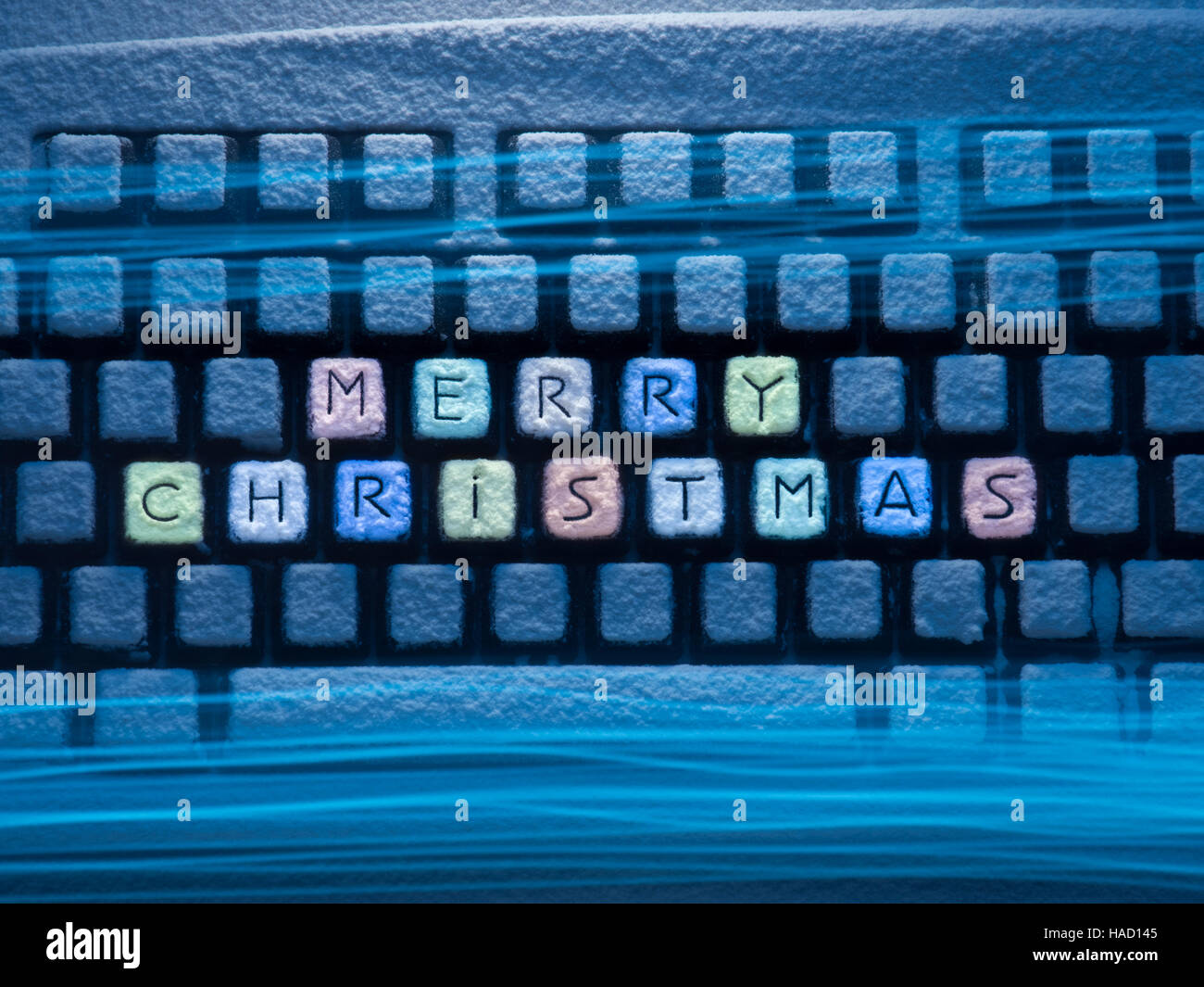 keyboard with colored keys with the words Merry Christmas illuminated ...