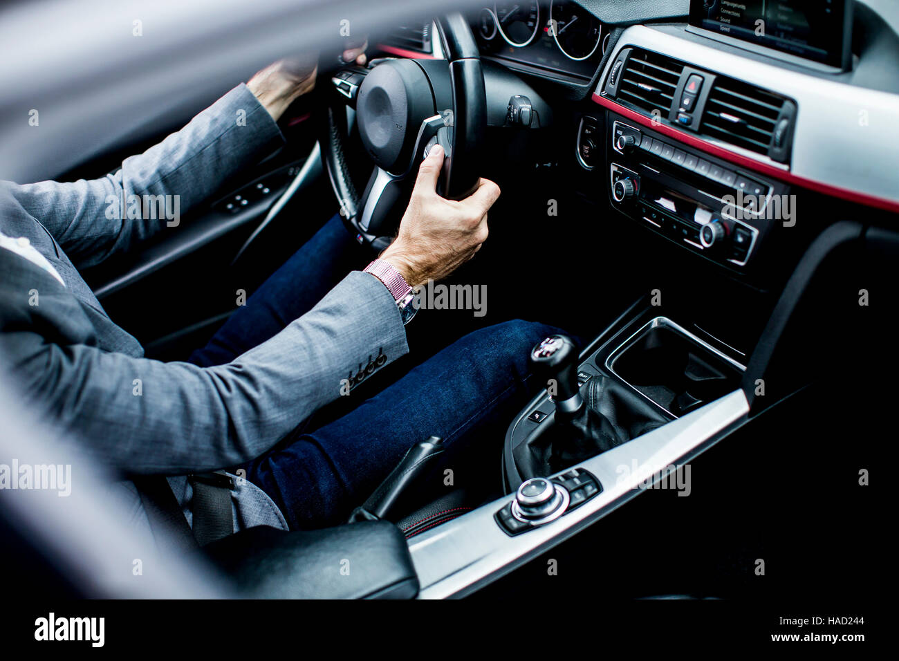 Young man driving in the modern car Stock Photo - Alamy