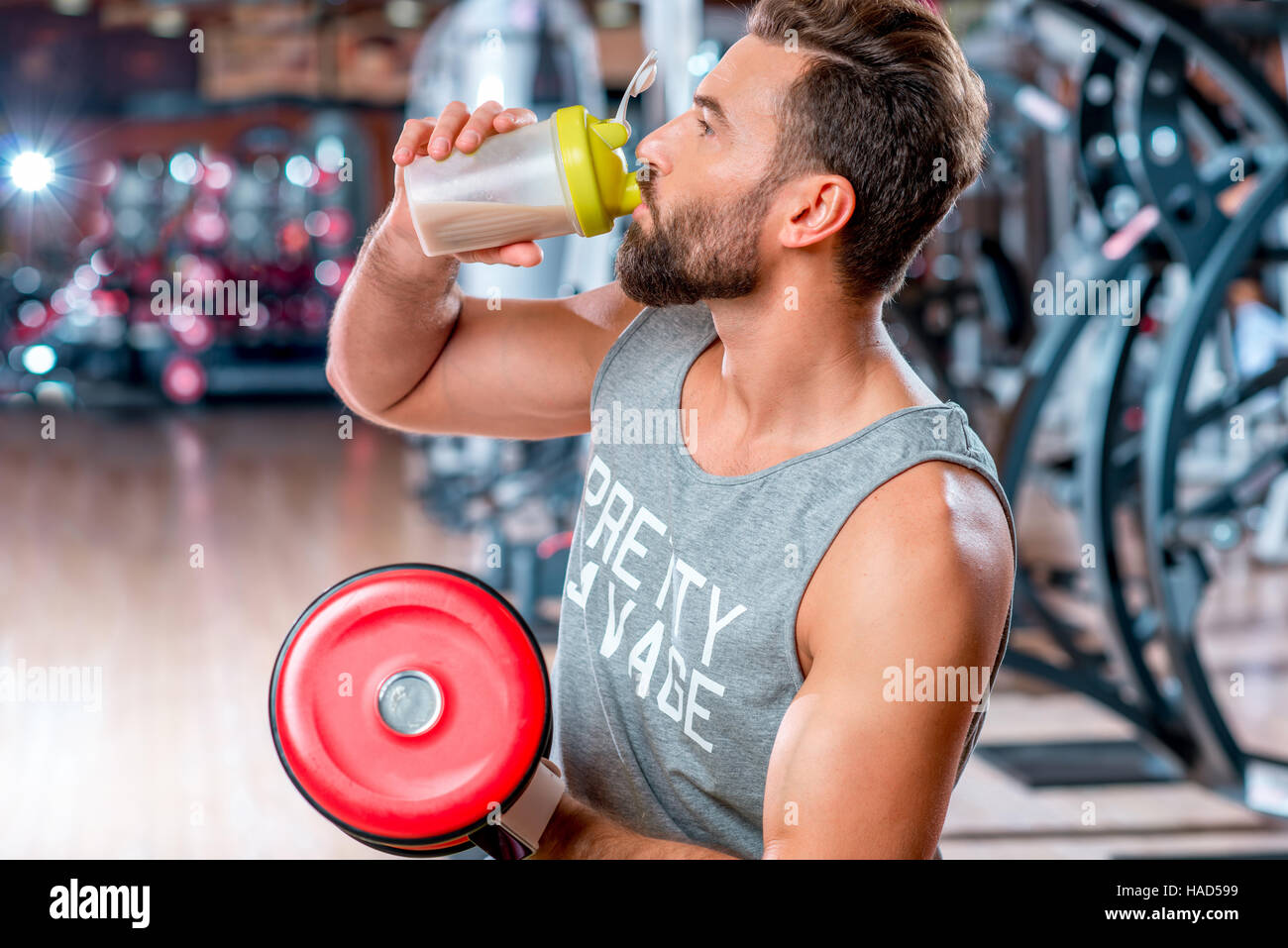 Man with sports nutrition Stock Photo - Alamy