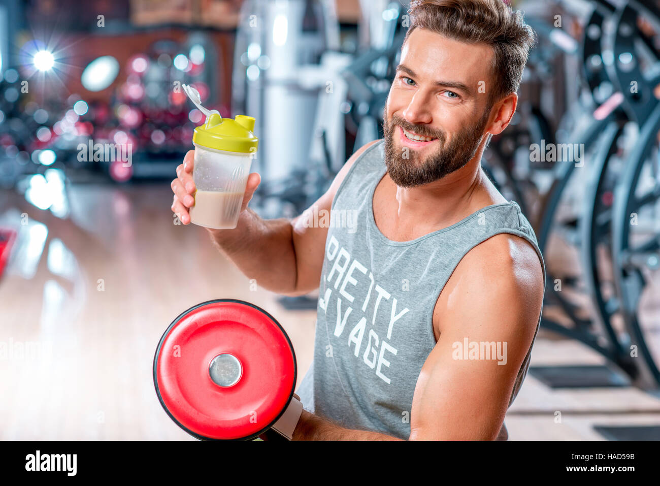 Man with sports nutrition Stock Photo - Alamy