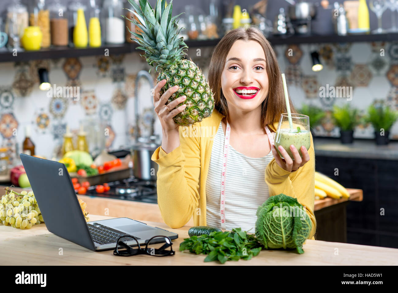 Woman drinking smoothie Stock Photo - Alamy