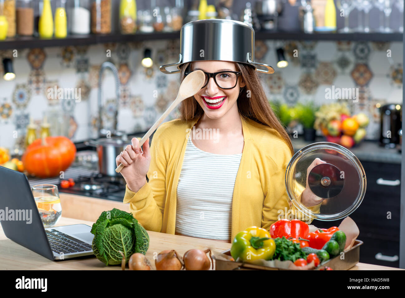 Woman in the kitchen Stock Photo - Alamy