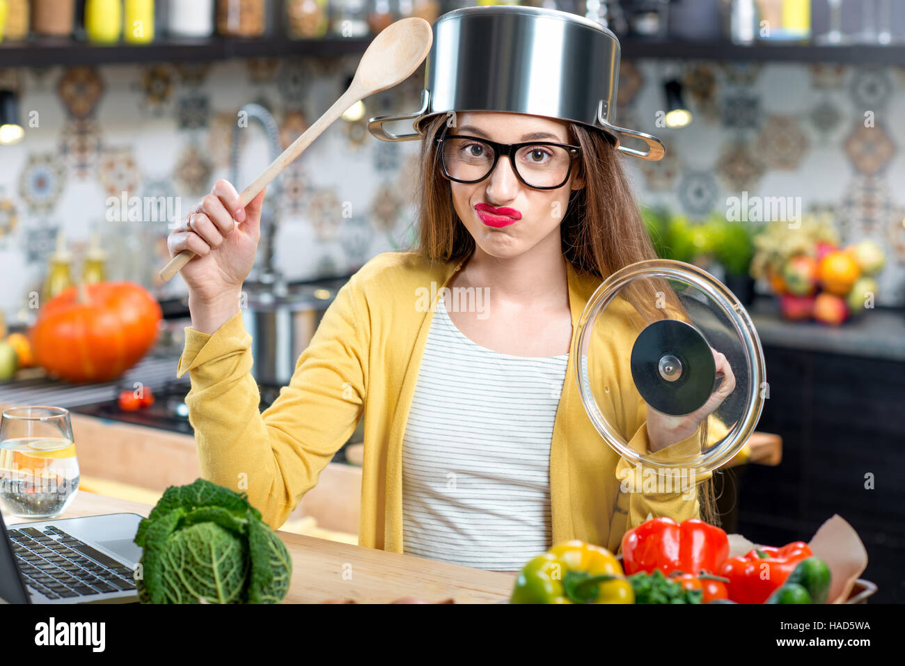 Woman in the kitchen Stock Photo - Alamy