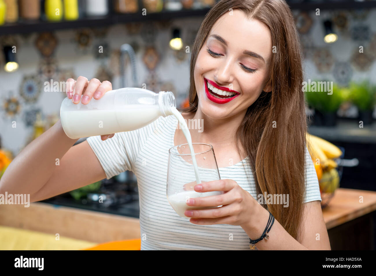 Woman drinking milk young hi-res stock photography and images - Alamy