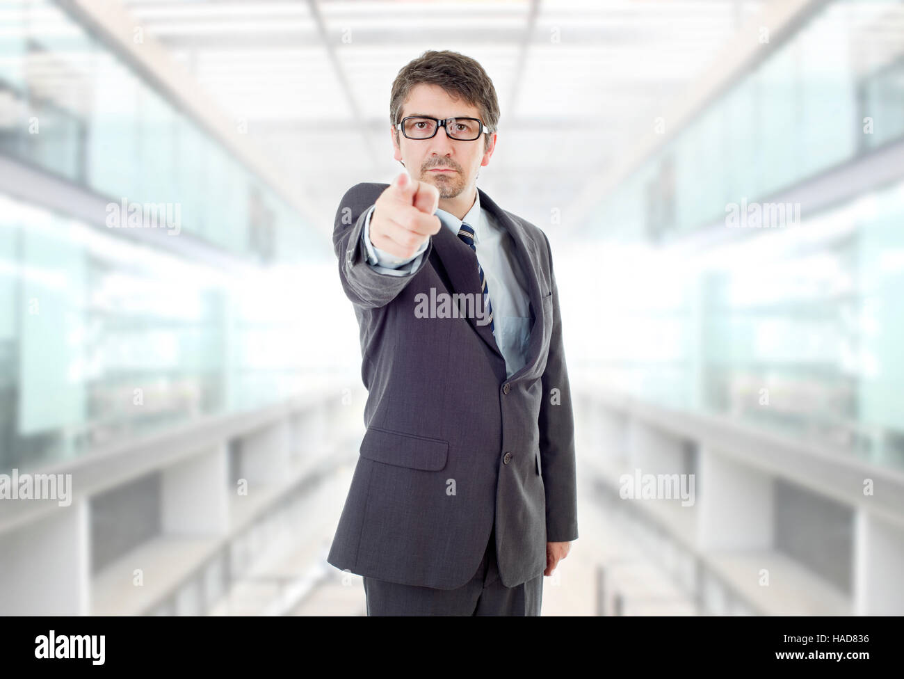 mad business man pointing, at the office Stock Photo - Alamy