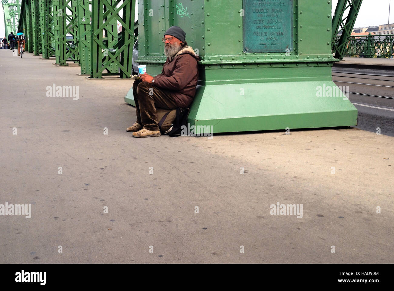 Budapest, Hungary. A homeless begging on the Liberty Bridge Stock Photo ...