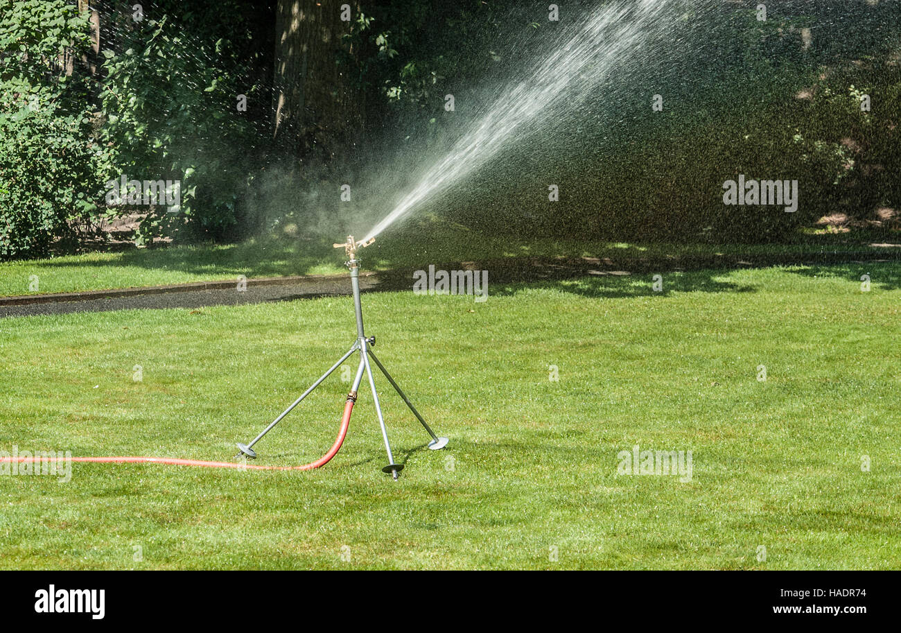 Lawn sprinkler hi-res stock photography and images - Alamy