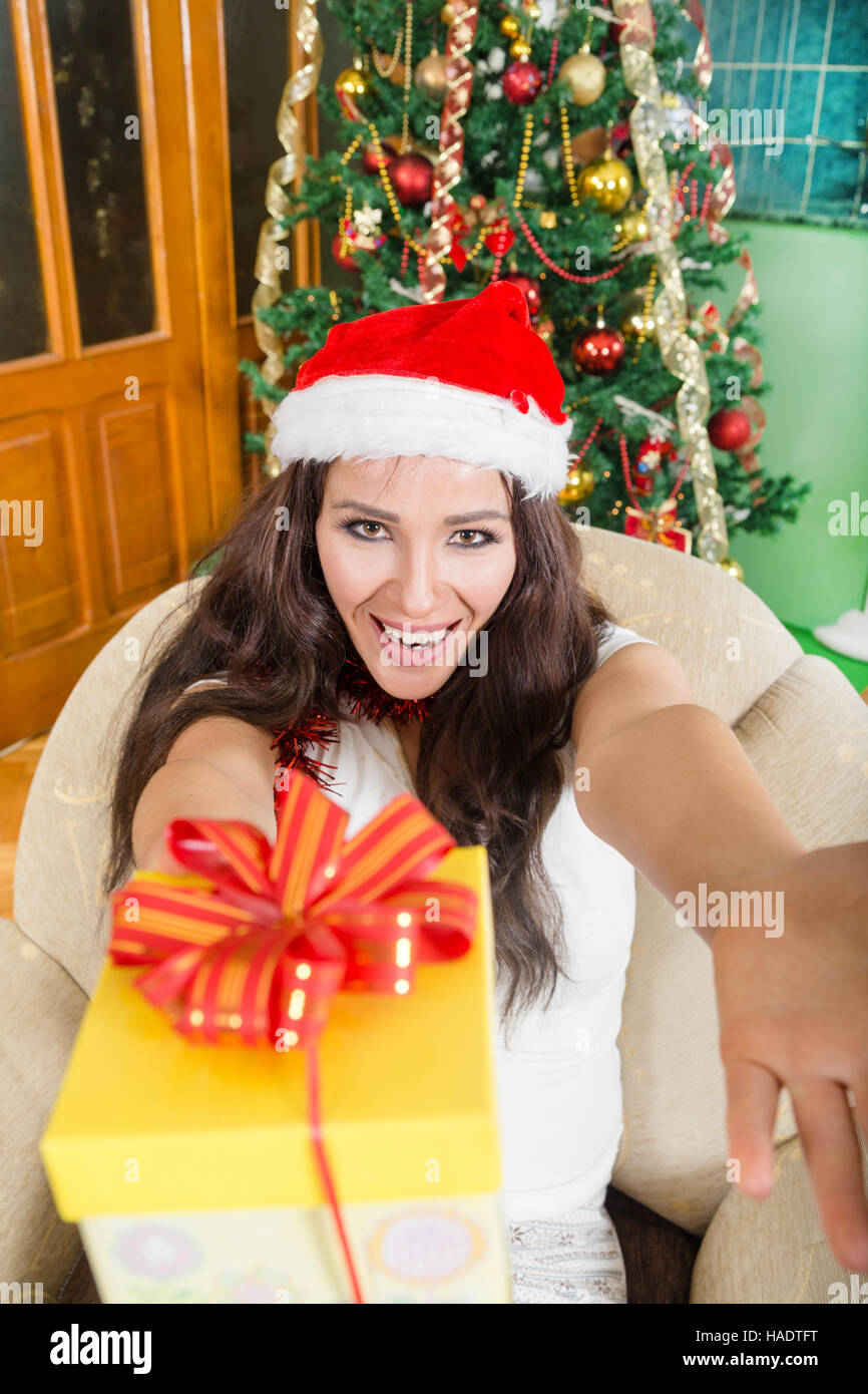 Happy Young Woman Proffering Gift Box with Joy and Generosity , Pretty ...