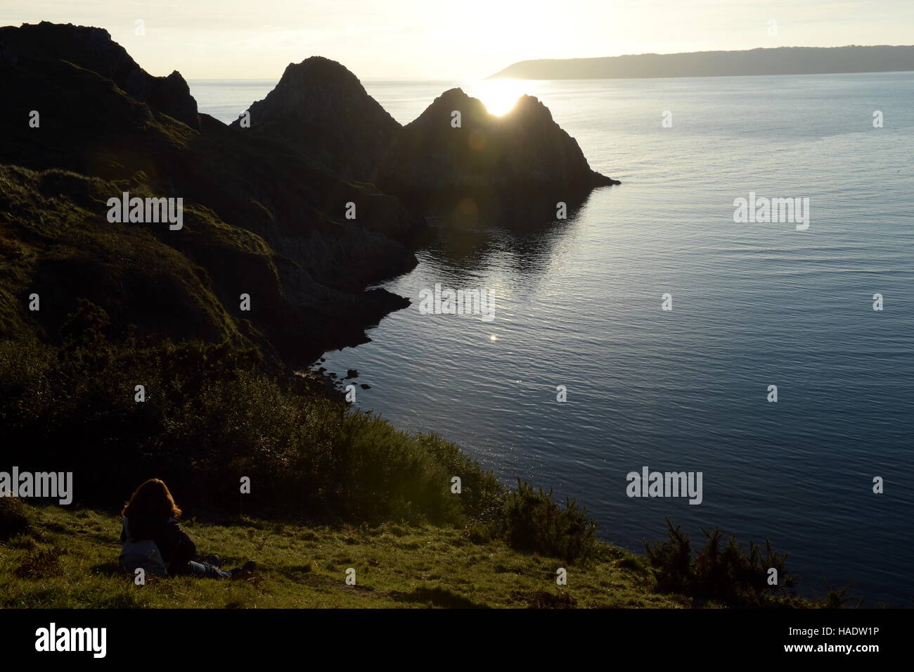 Three cliffs bay, Gower, Wales at sunset . A high tide fills the valley ...