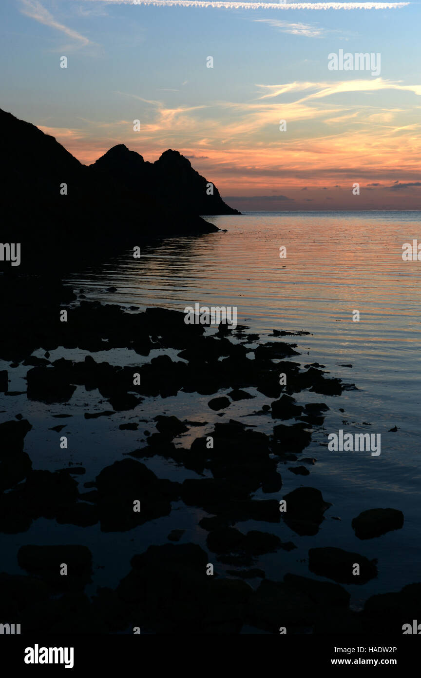 Three Cliffs Bay, Gower, Wales at sunset . A high tide fills the valley ...