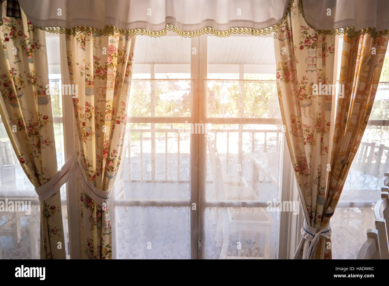 Window and curtains. Porch behind the window. Go meet the summer. Spend ...