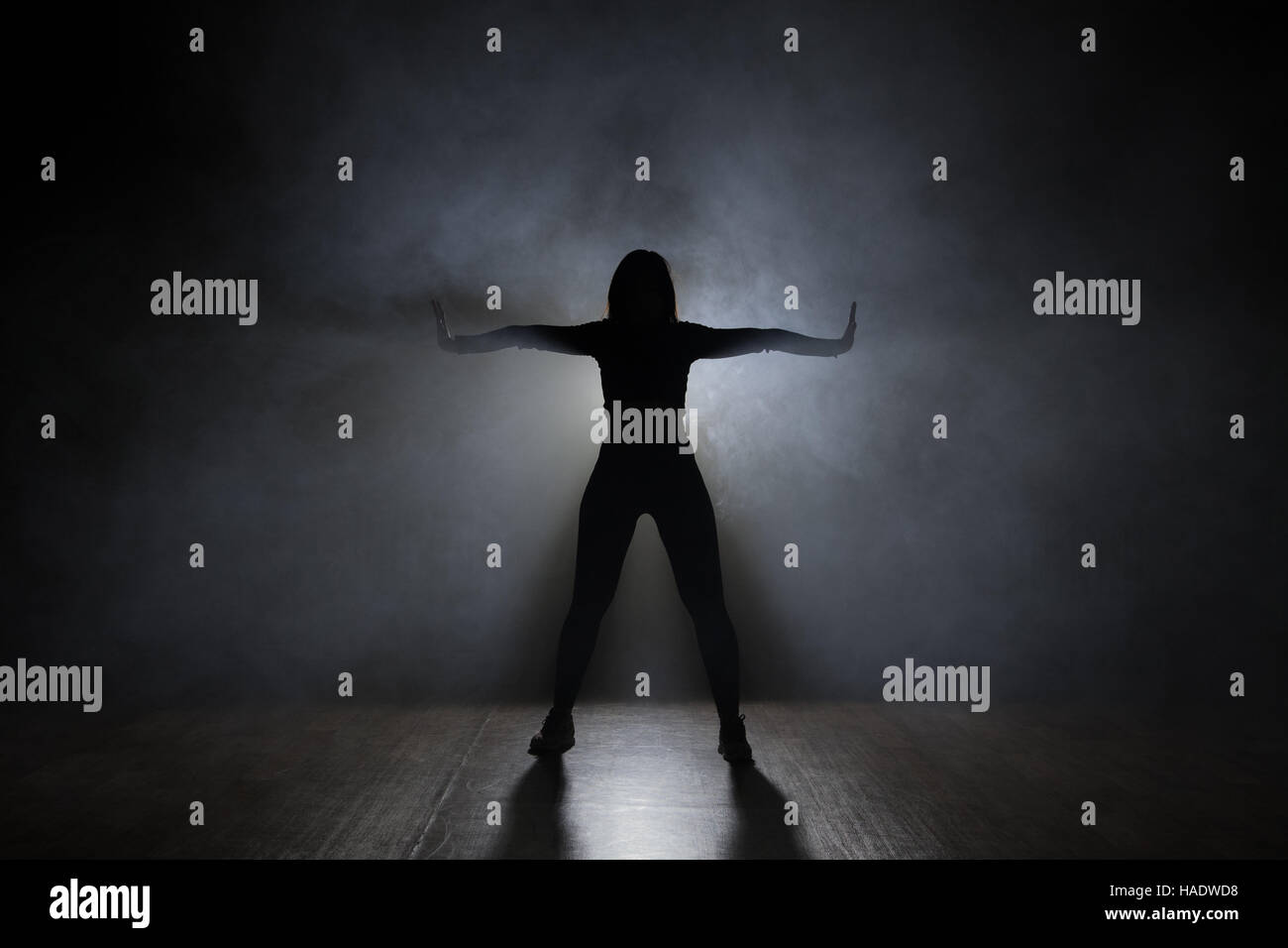 Girl dancing. backlight Stock Photo - Alamy
