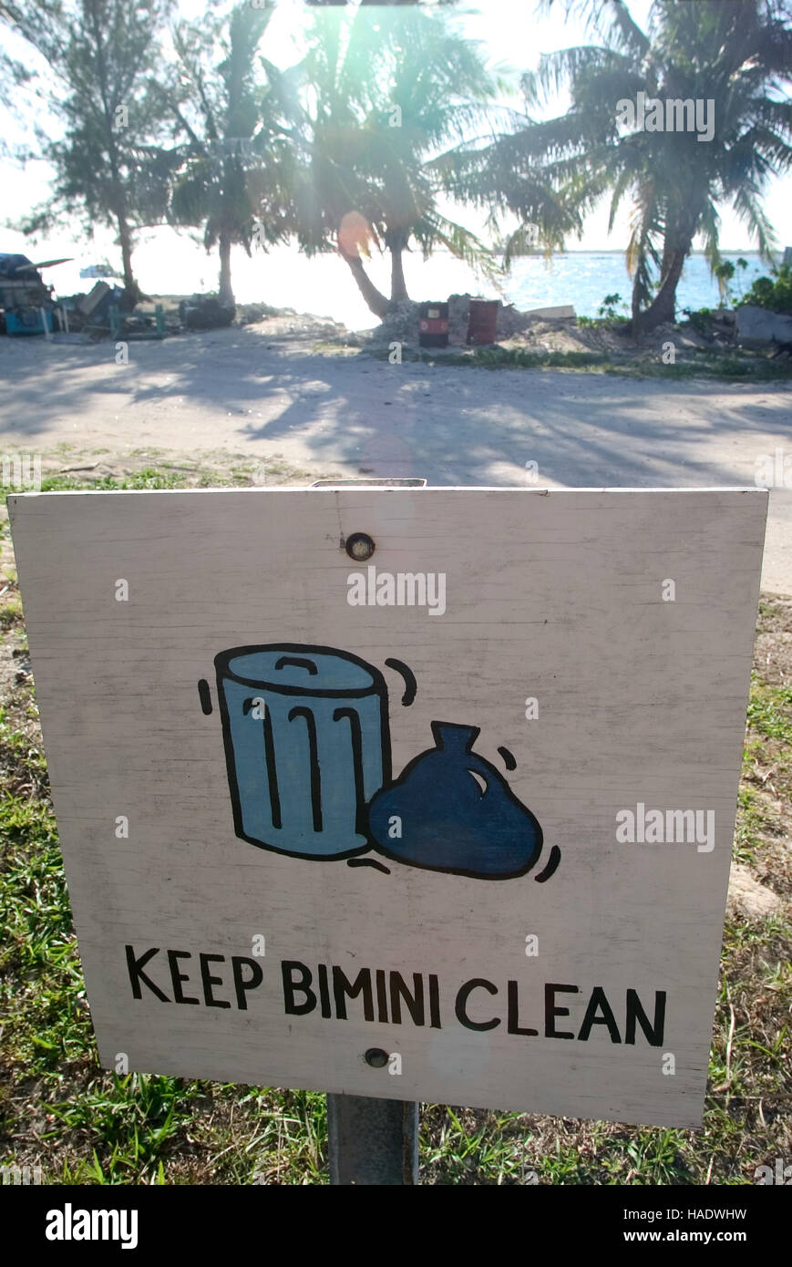A hand-painted Keep Bimini Clean sign along a palm line street in the ...