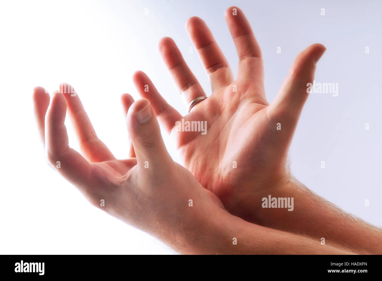Hands seeking help Stock Photo - Alamy