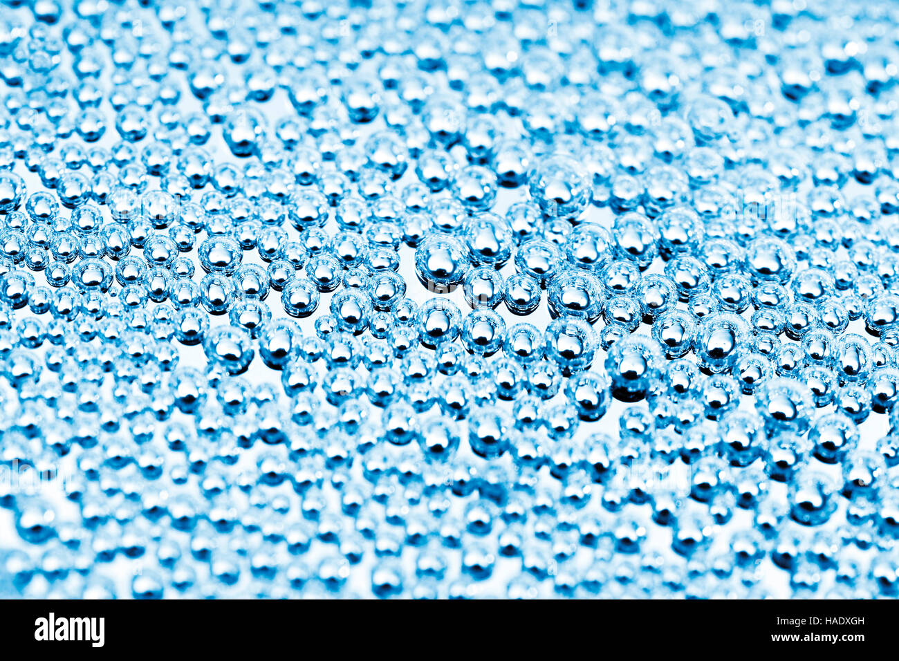 Bubbles in sparkling water Stock Photo - Alamy