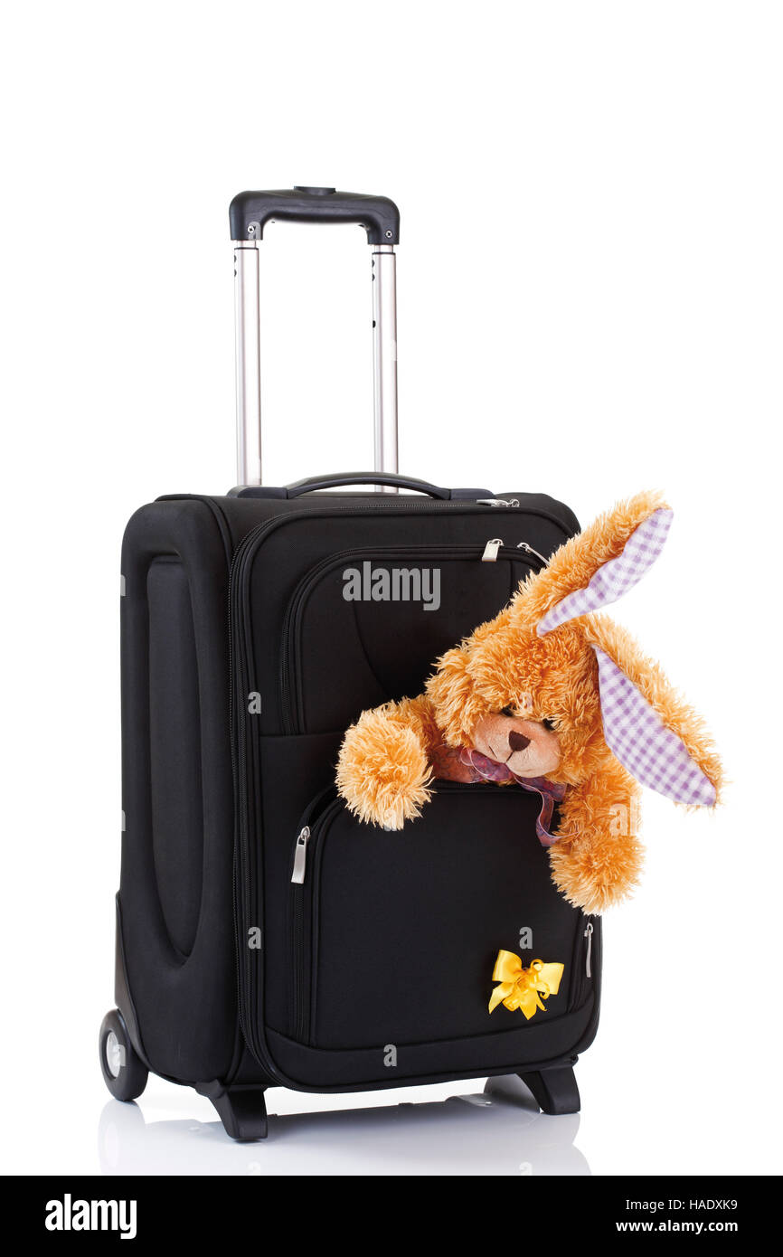 Easter bunny soft toy in a trolley going on easter holidays Stock Photo ...