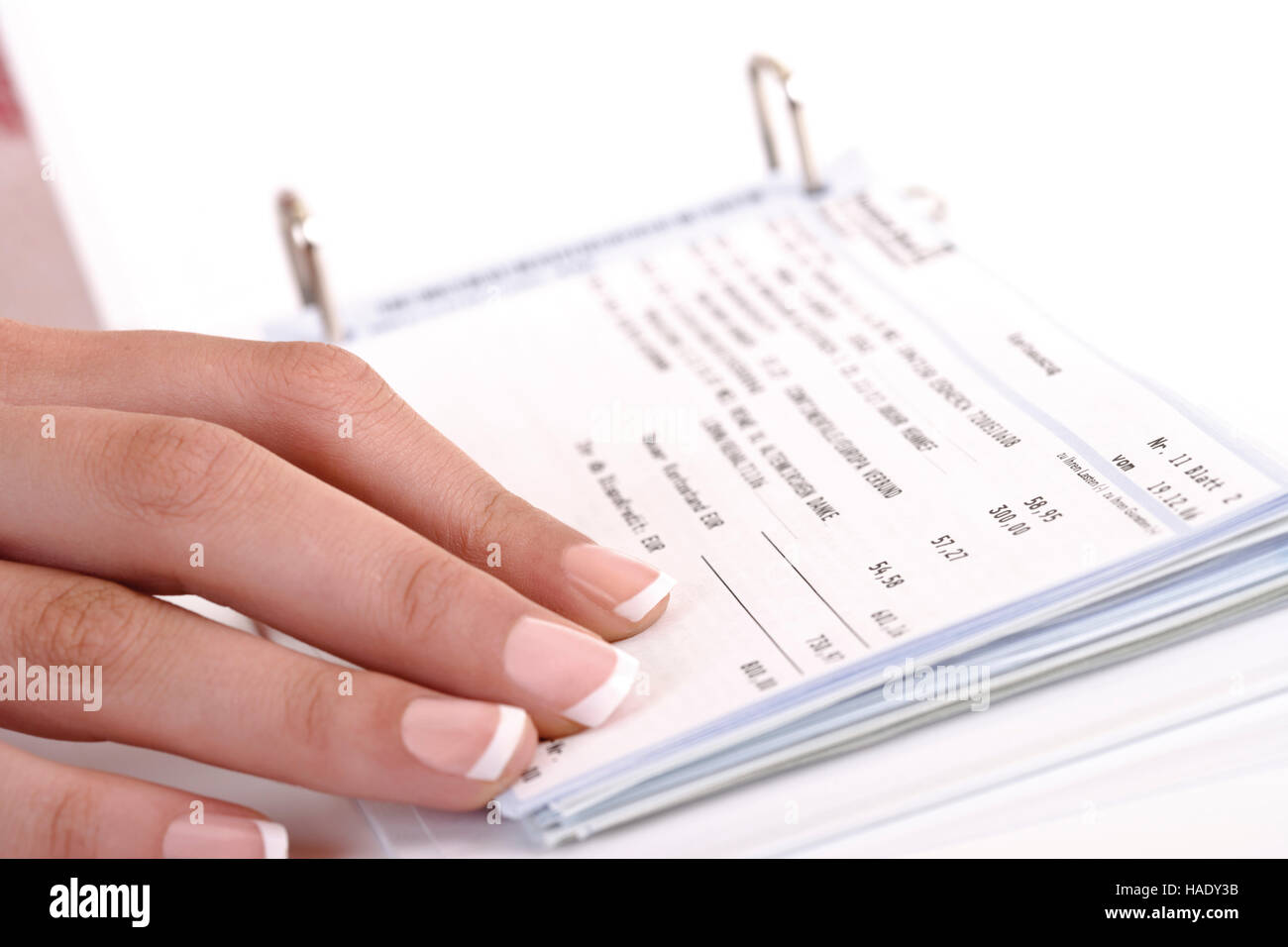 Womans hand on bank statements Stock Photo - Alamy