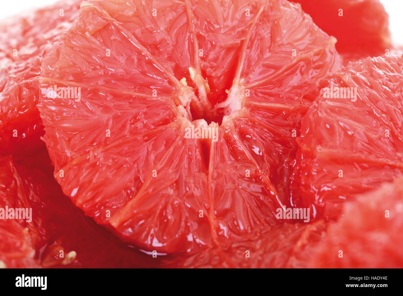 Filet slices of ruby red grape fruit Stock Photo - Alamy