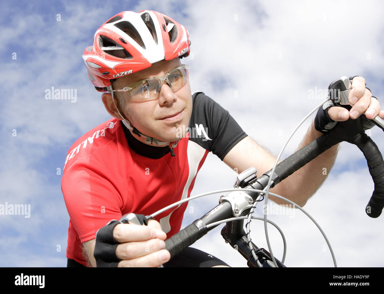 Cyclists wearing helmet hi-res stock photography and images - Alamy