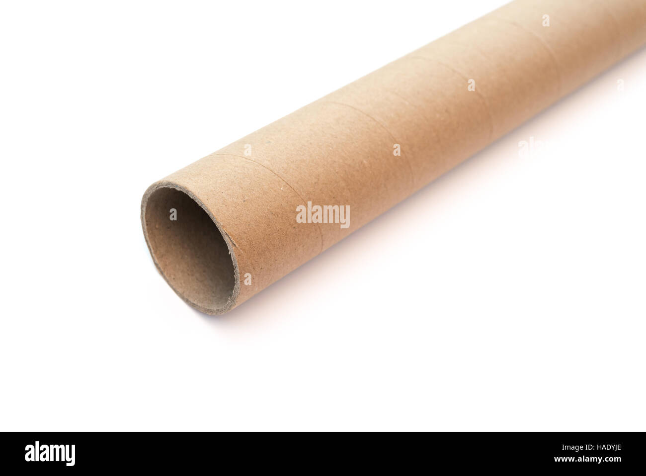 side view brown paper roll on a white background Stock Photo - Alamy