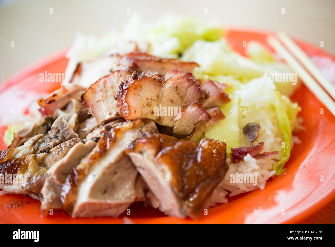 fast food of barbeque pork and roasted duck with rice and cabbage Stock ...