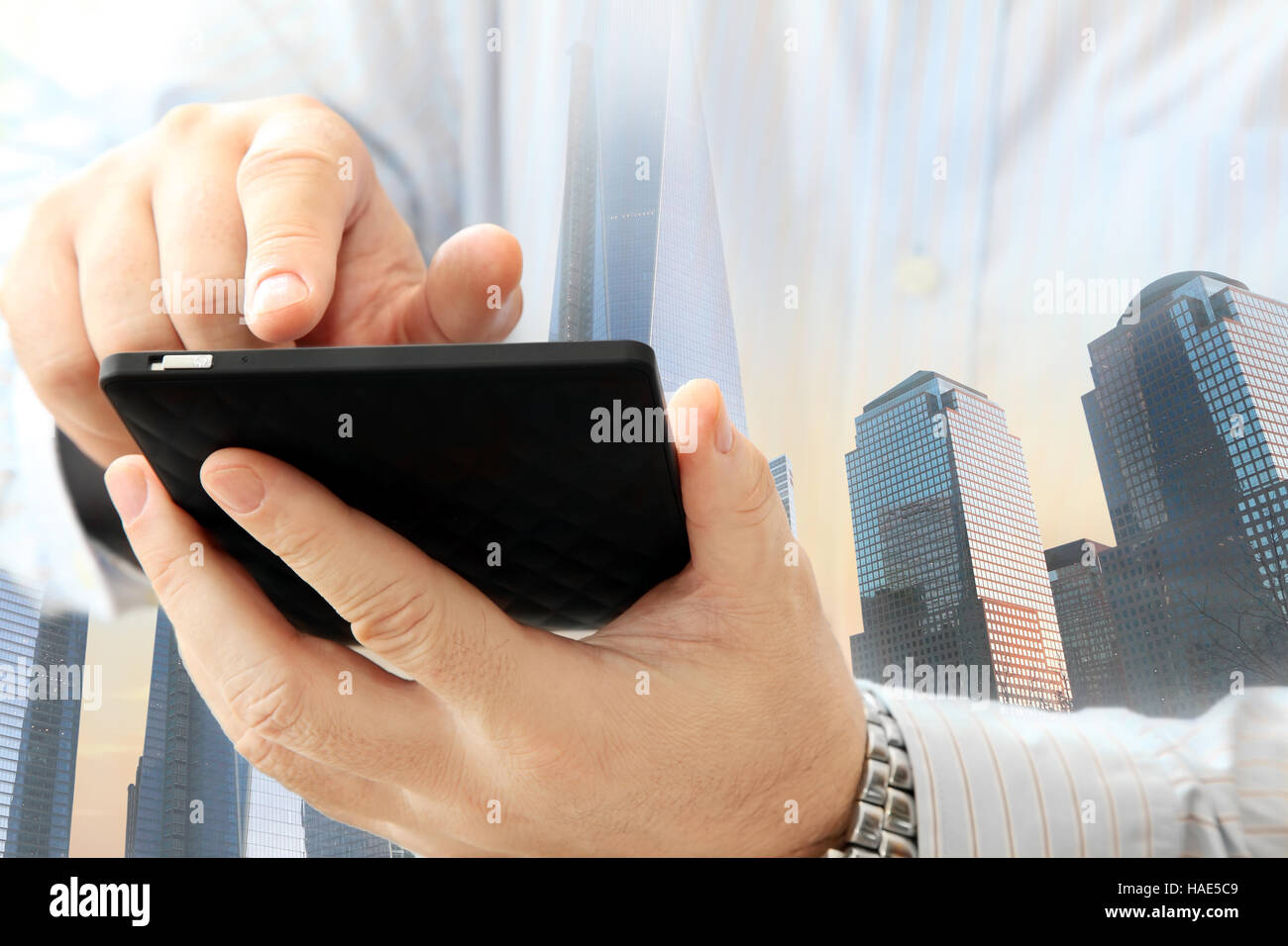 Man using smartphone Stock Photo - Alamy