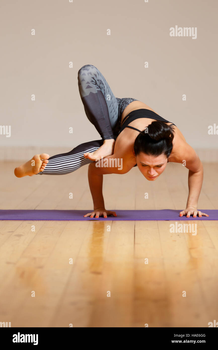 Woman doing exercise on balance Stock Photo - Alamy
