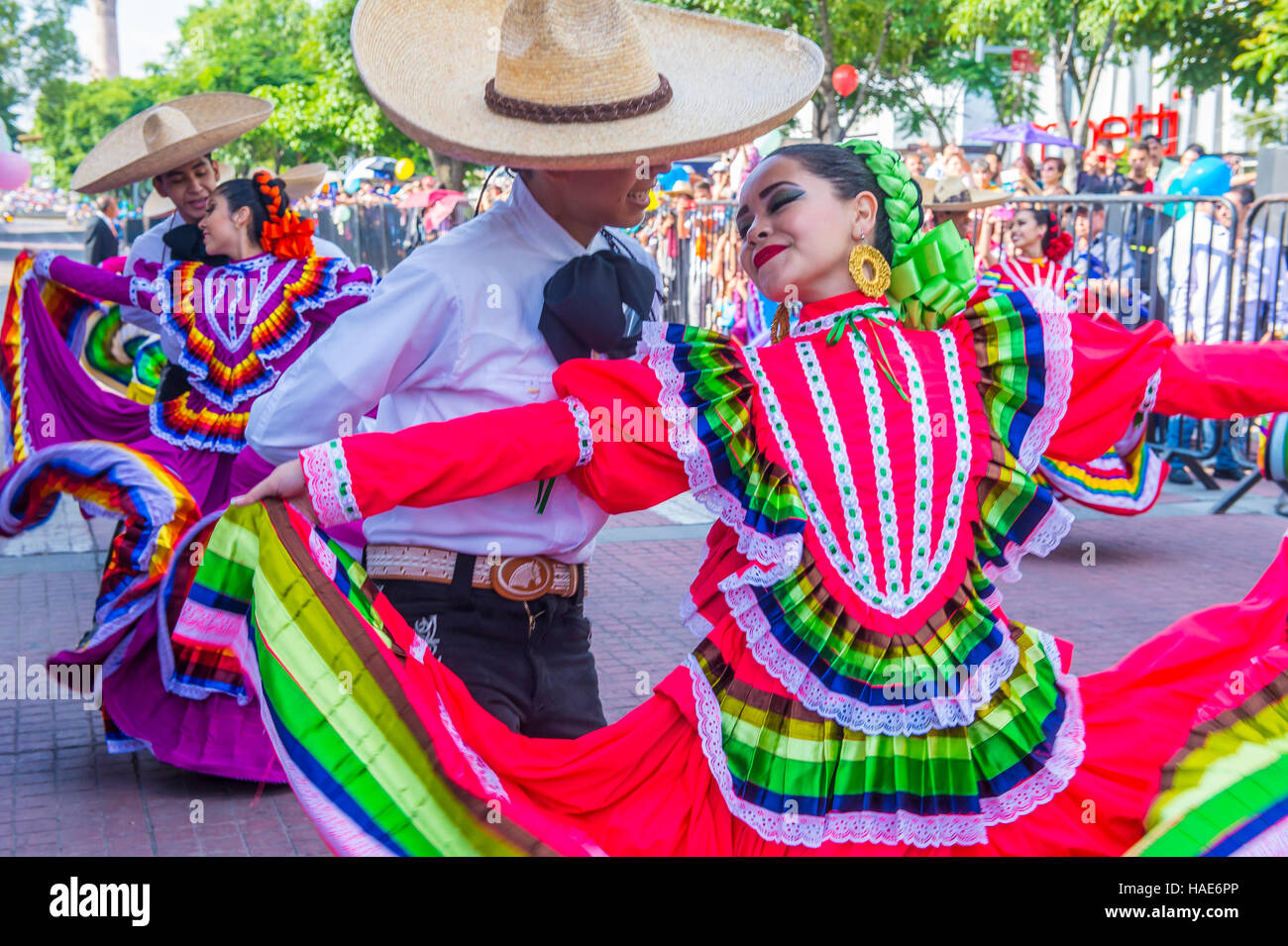 Participants in a parade during the 23rd International Mariachi ...