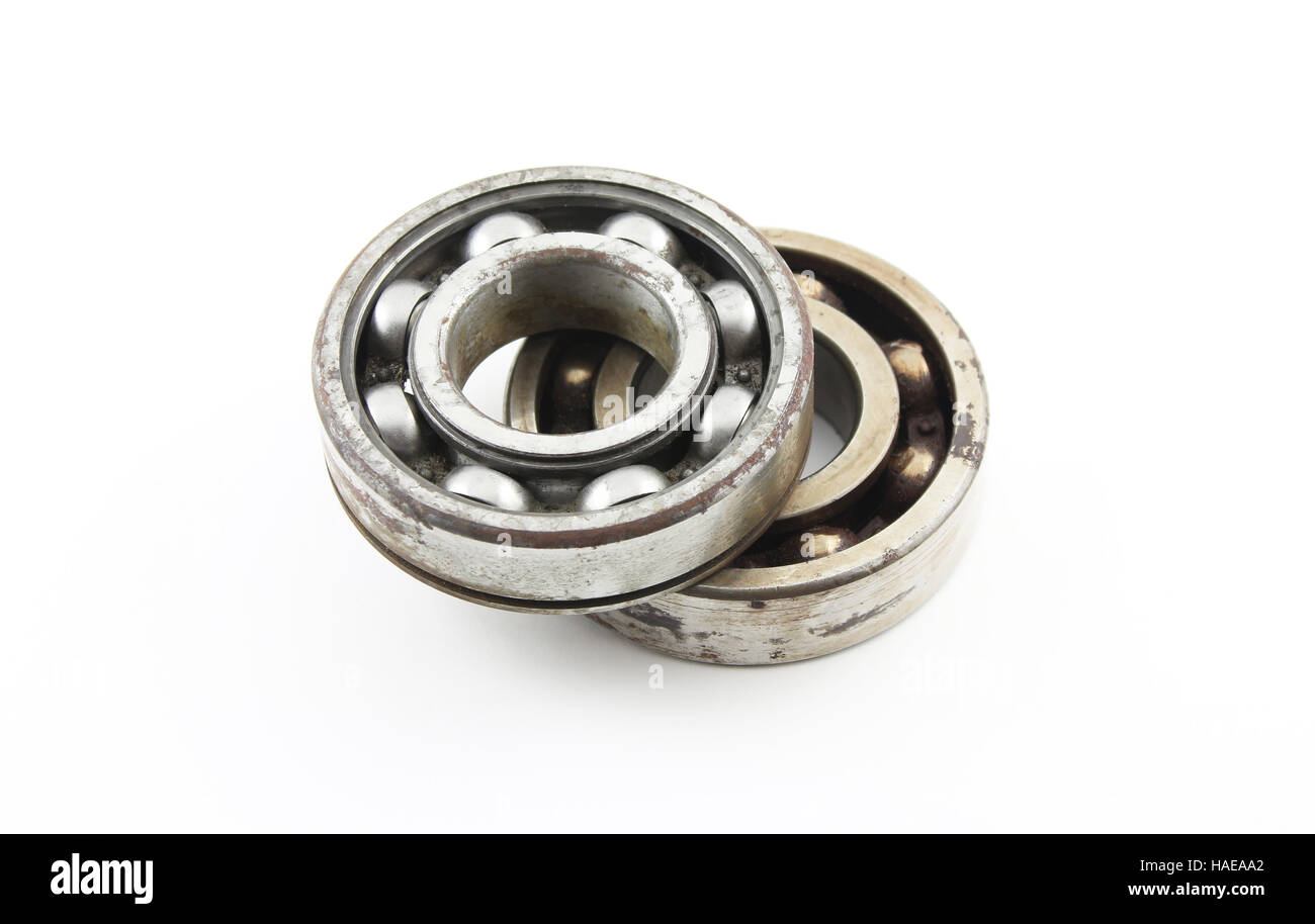 Two old rusty bearing on a white background Stock Photo - Alamy