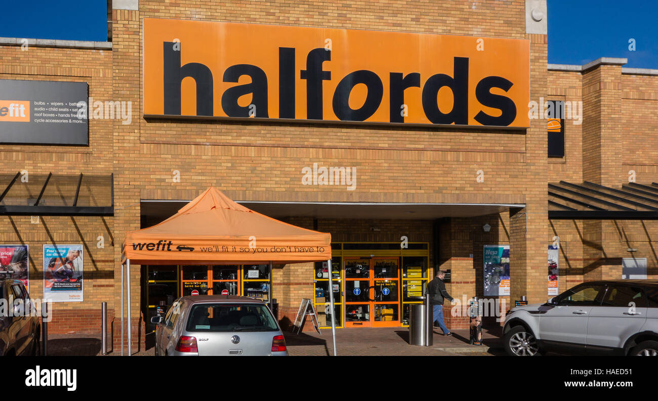 Entrance to halfords retail shop in Woking, Surrey, UK Stock Photo - Alamy