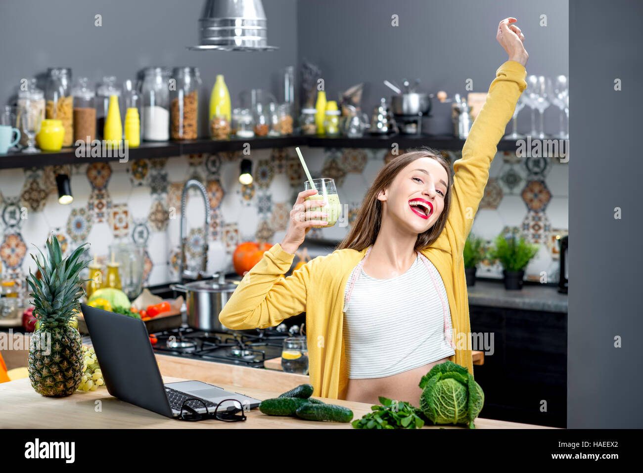 Woman drinking smoothie Stock Photo - Alamy
