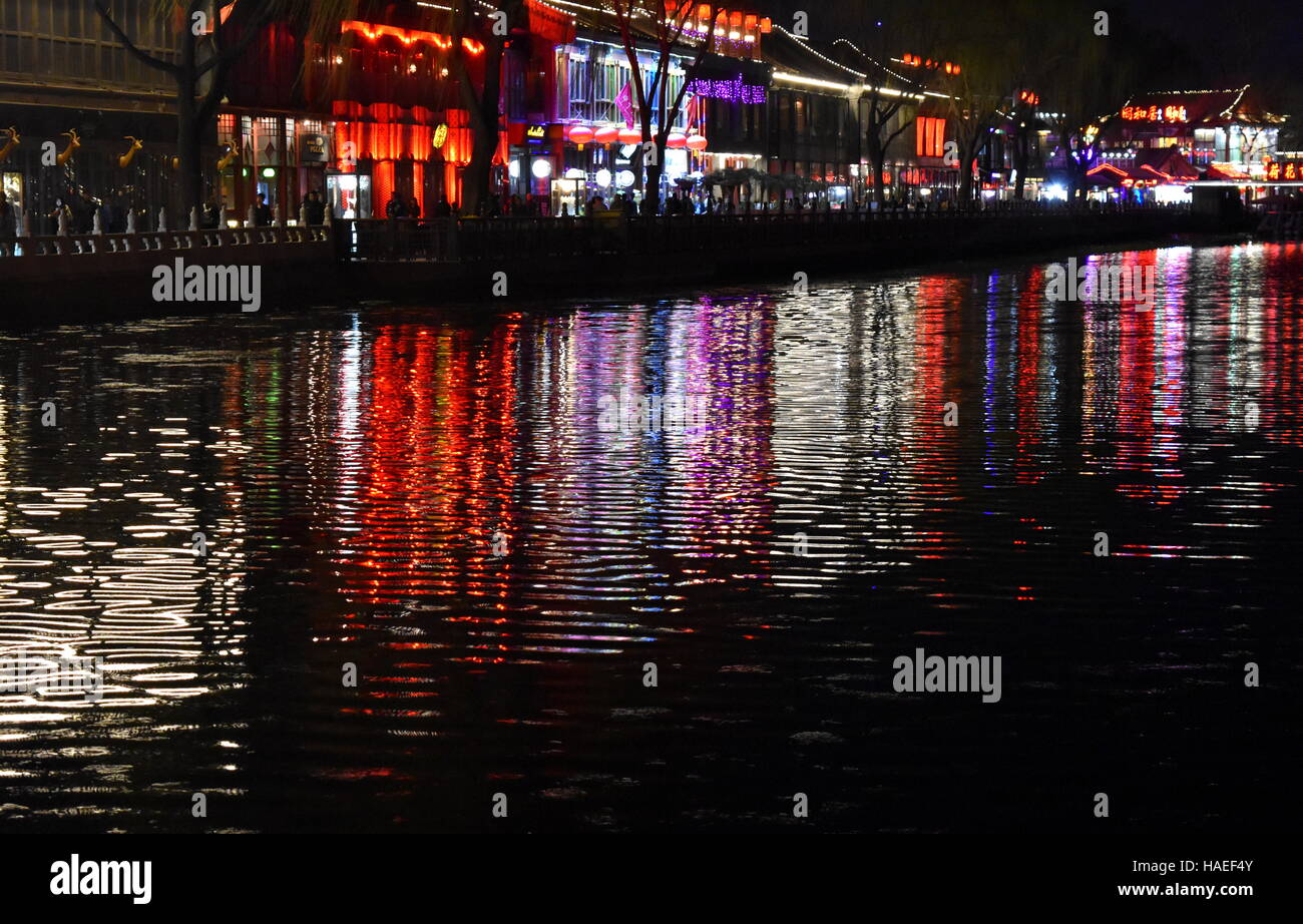 Beijing nightlife water reflections in Qianhai lake historical district ...