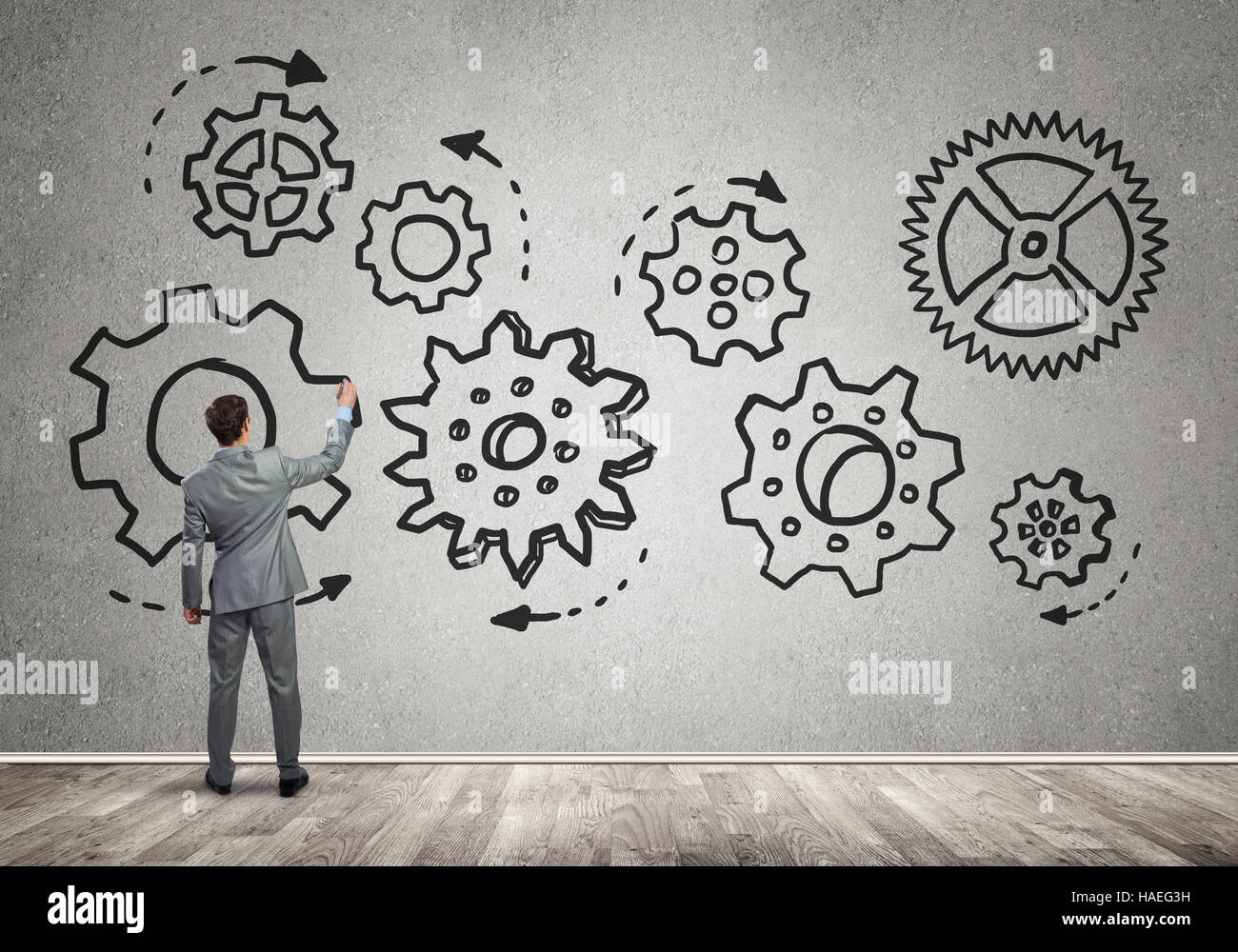 Businessman standing with back and drawing concept of teamwork and ...
