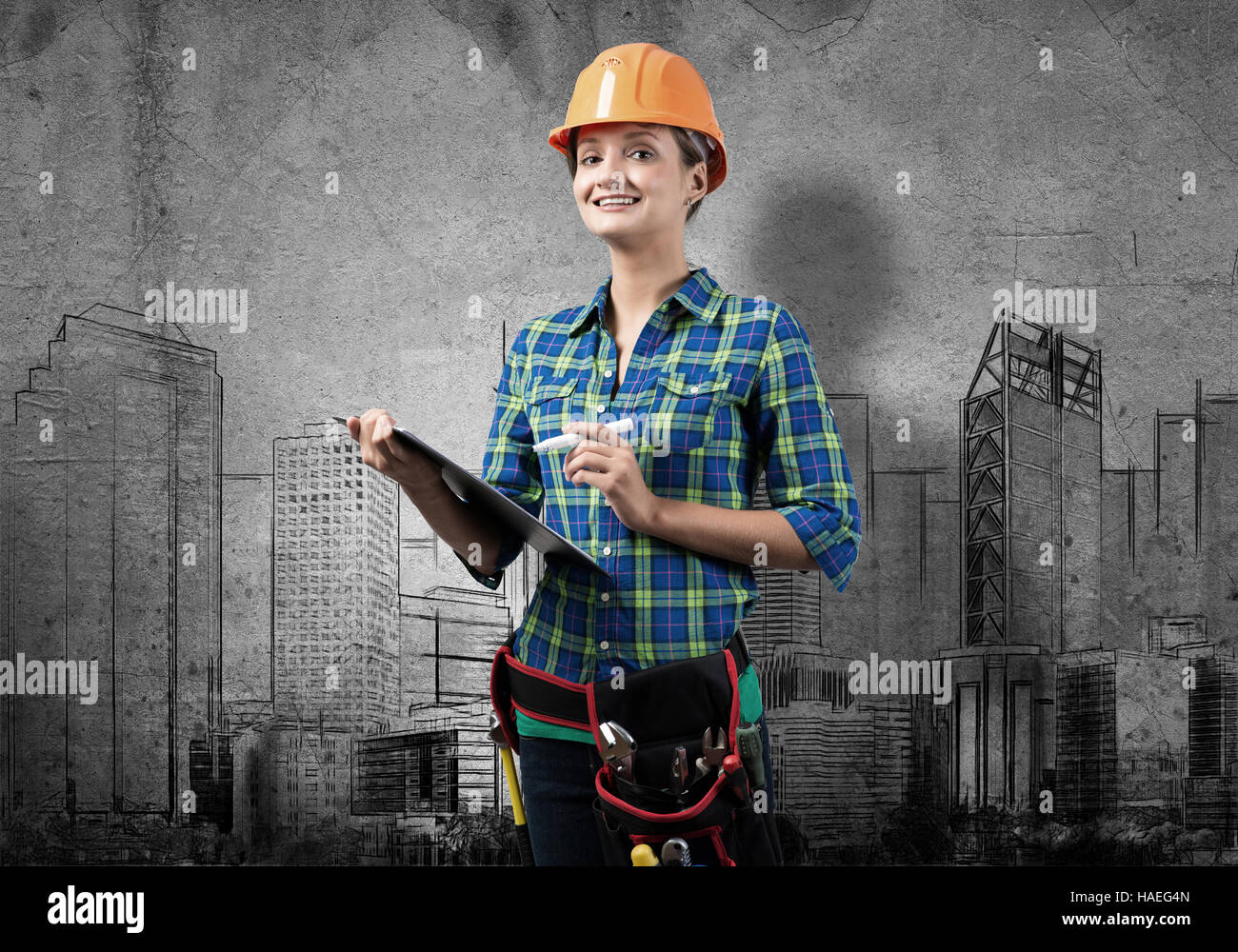 Engineer woman with folder and sketches of construction project on wall ...