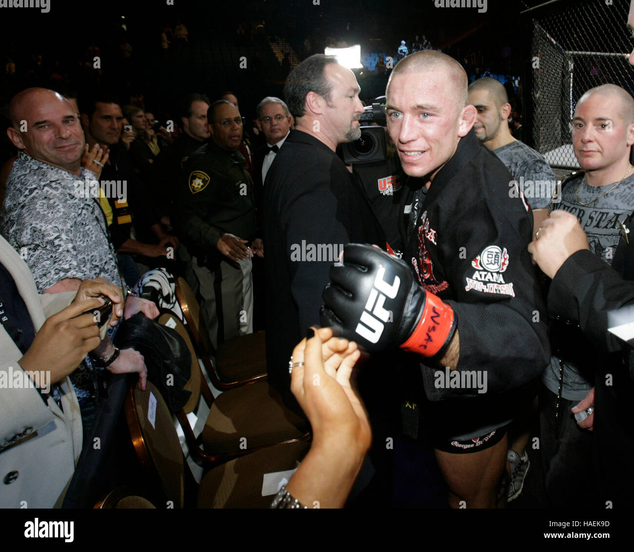 Georges St.-Pierre, right, greets fans after he defeated BJ Penn at the ...