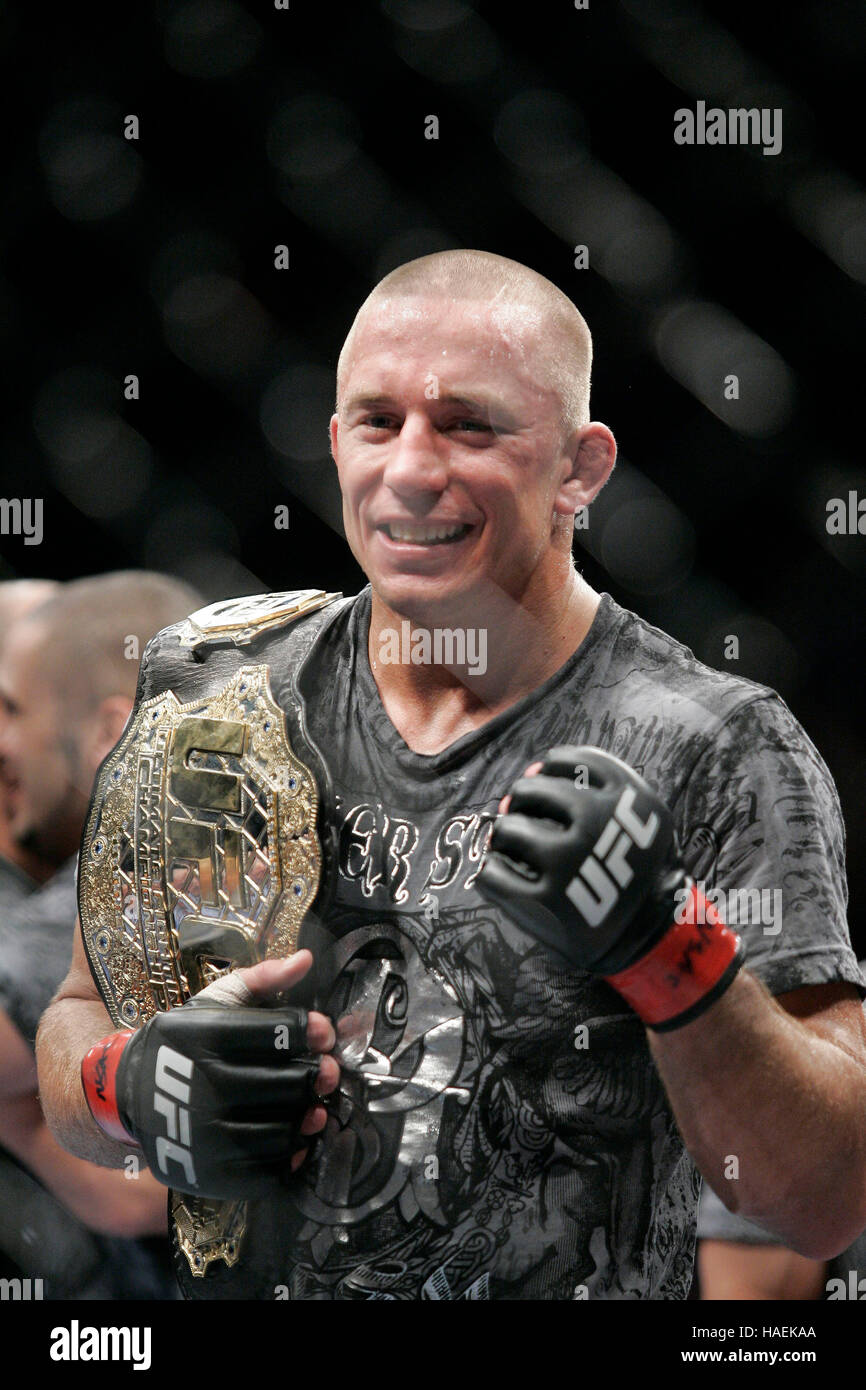 Georges St.-Pierre celebrates his victory over BJ Penn at the UFC 94 at ...